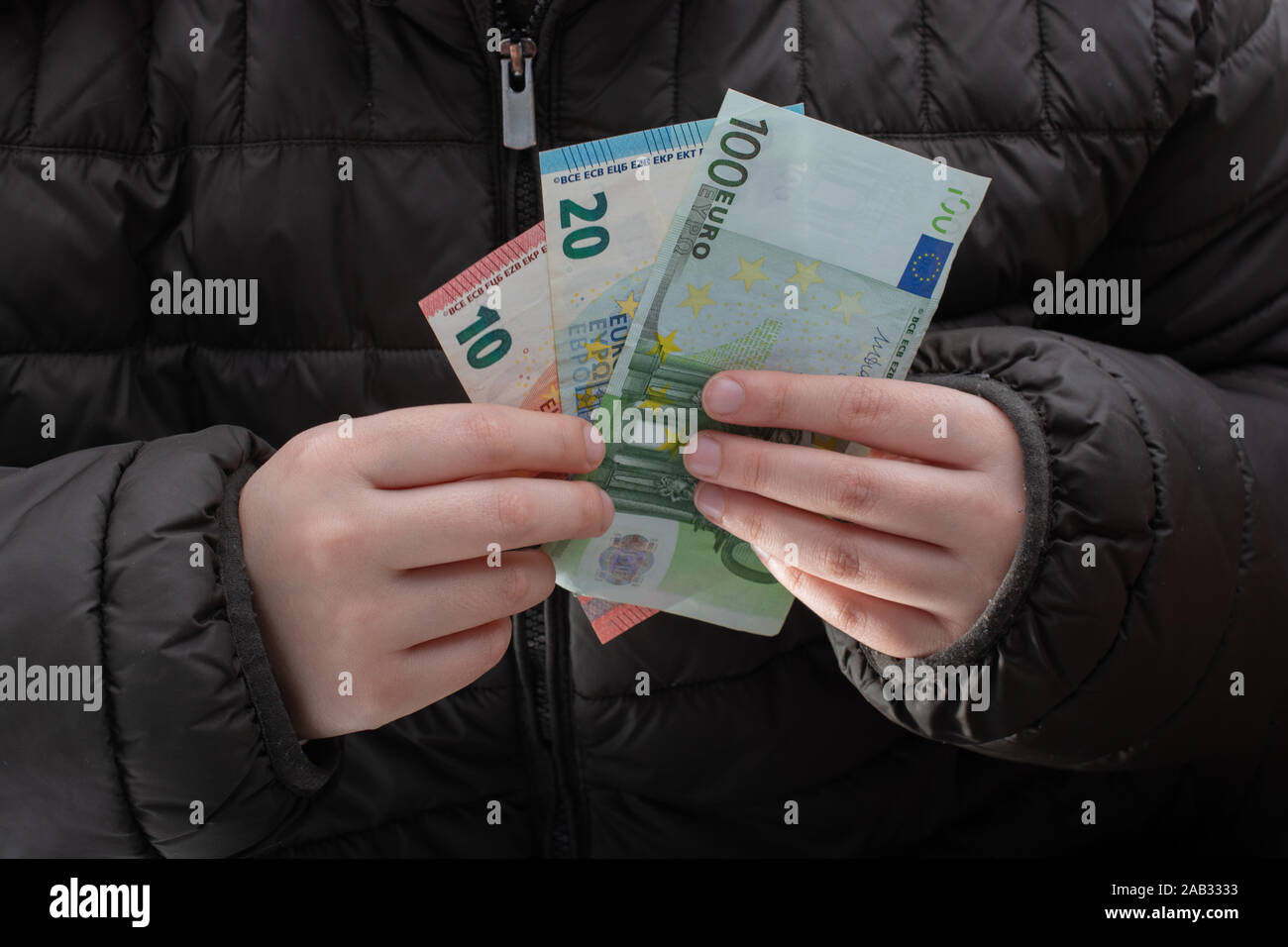 Hands holding euro banknotes currencies as financial activity Stock ...