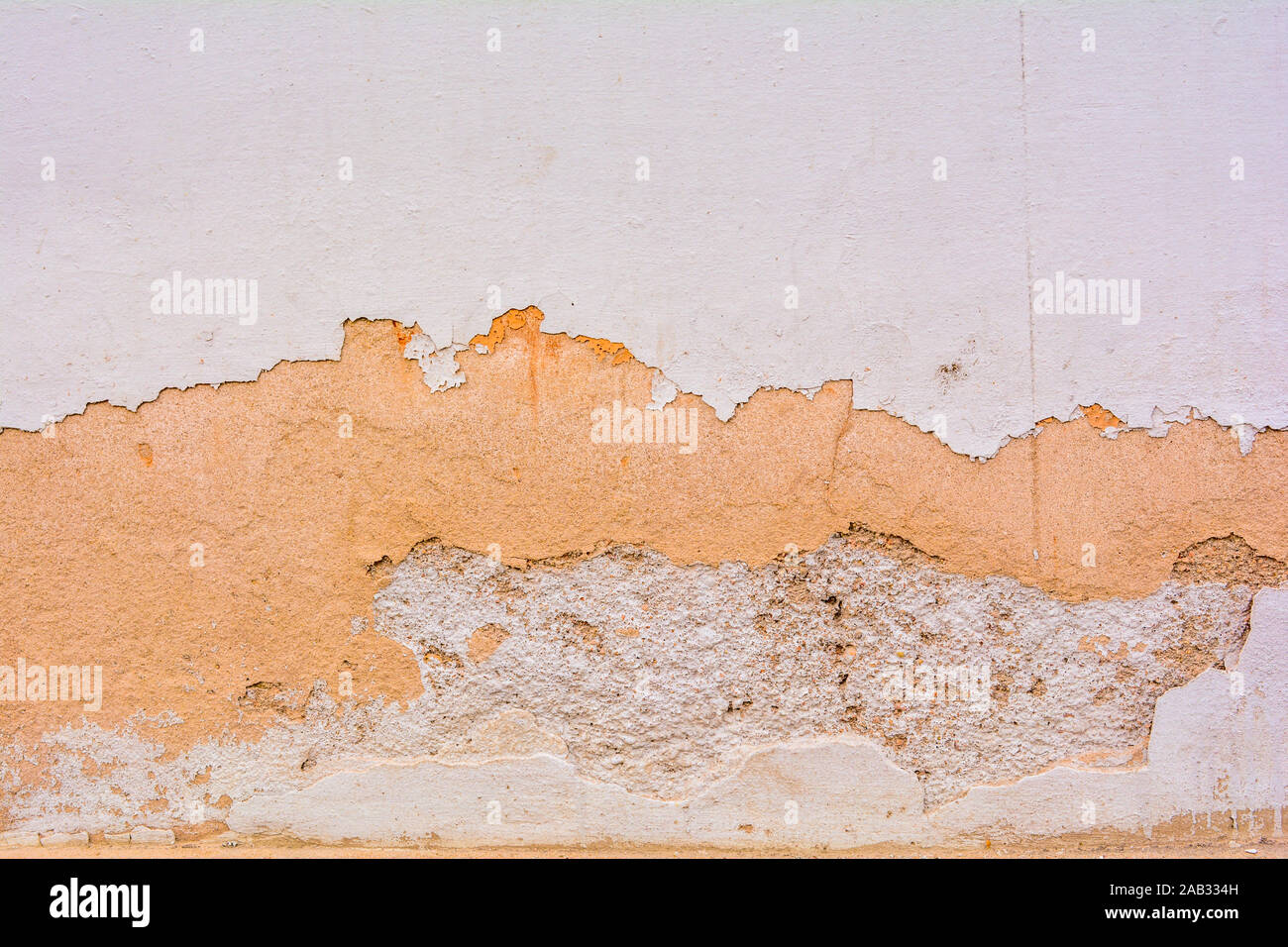Texture of dirty destroyed concrete wall with exfoliated layer of white ...