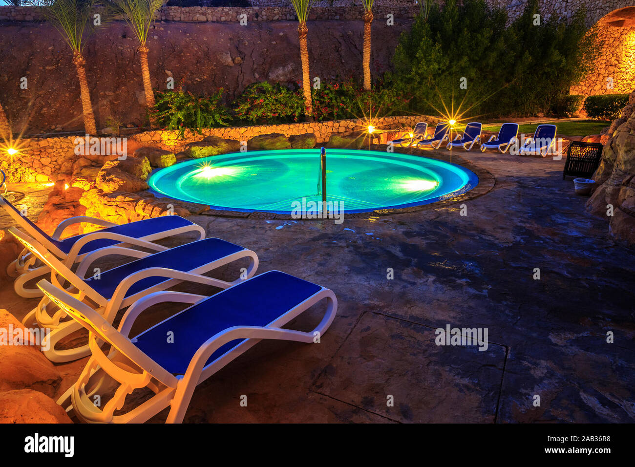 Evening view for luxury swimming pool in night illumination Stock Photo ...