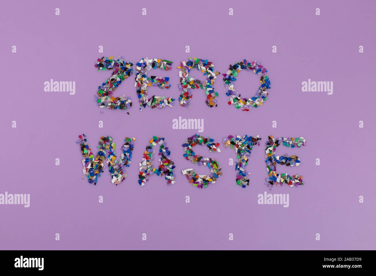 Zero waste text consisting of small recycled plastic pellets collected ...