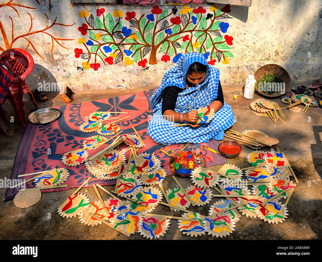 Village woman making crafts.Naya Village under Pingla Block is a small ...
