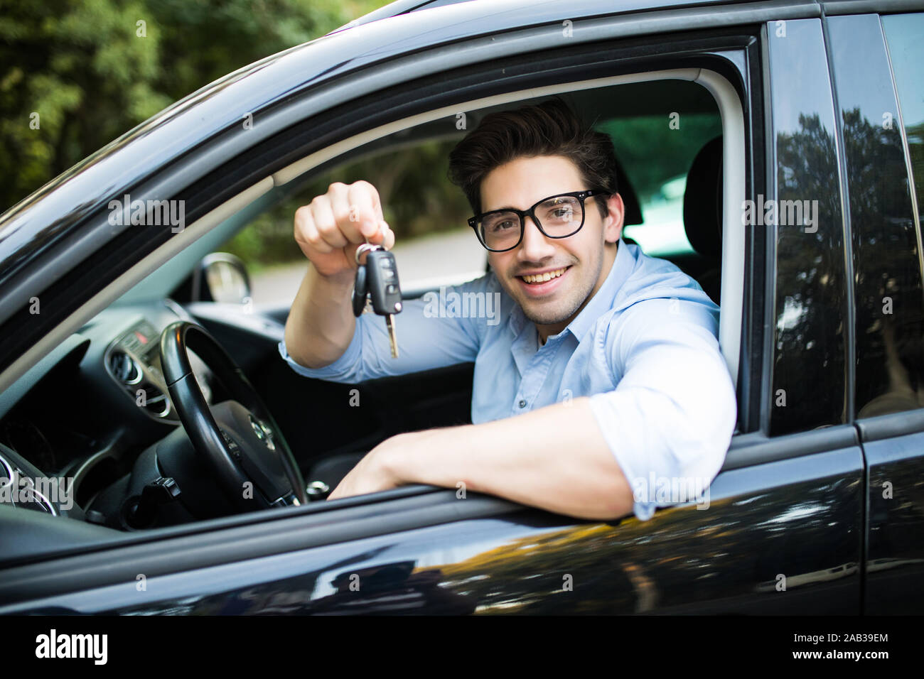 Indian man with car keys hi-res stock photography and images - Alamy