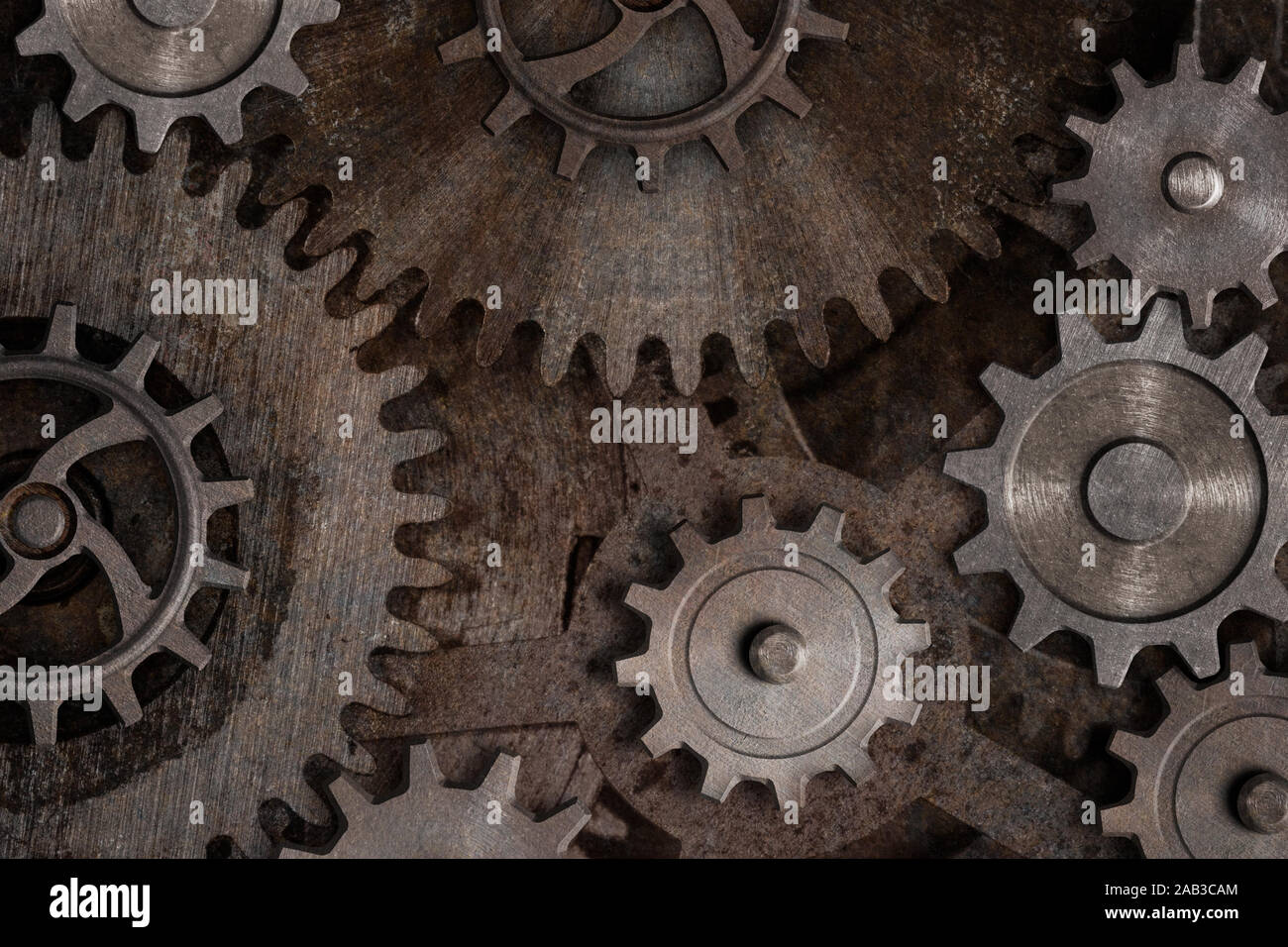 Rusty gears and cogs background Stock Photo - Alamy