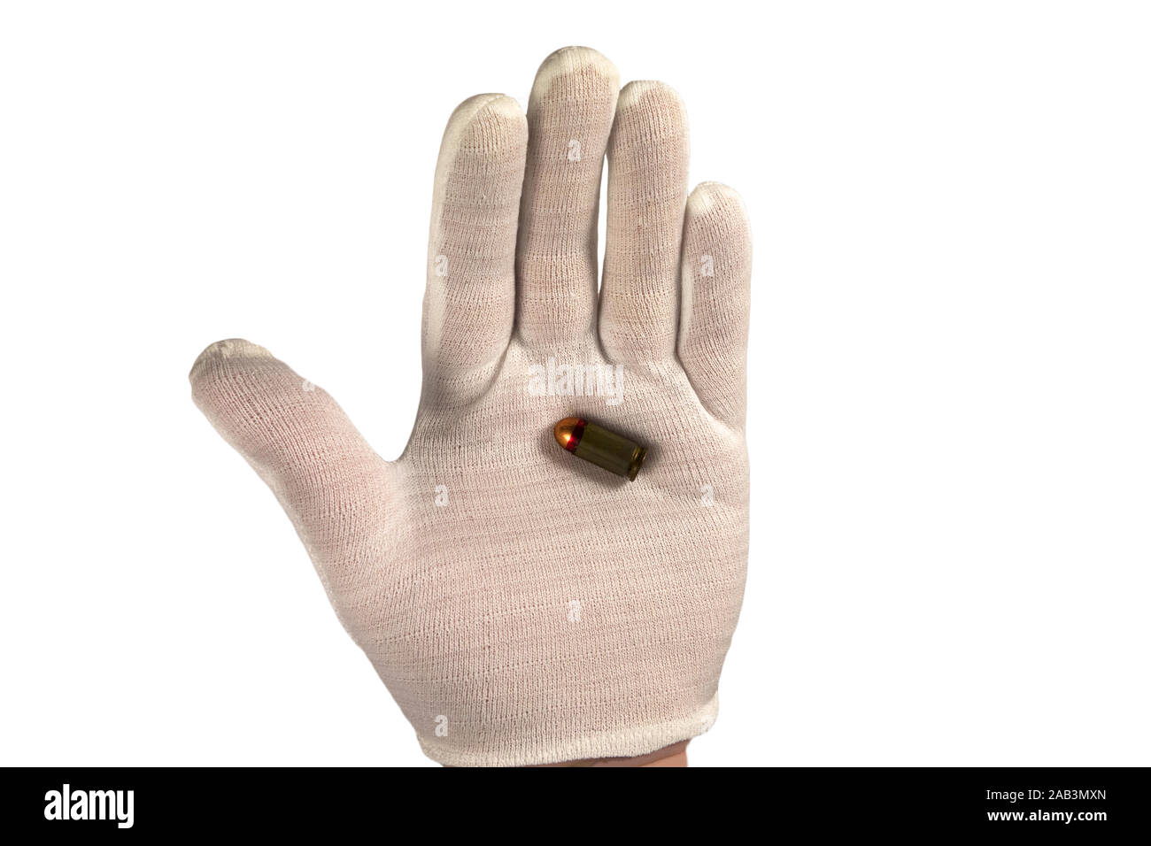 Hand in white glove holds one bullet on an open palm. Isolated closeup ...