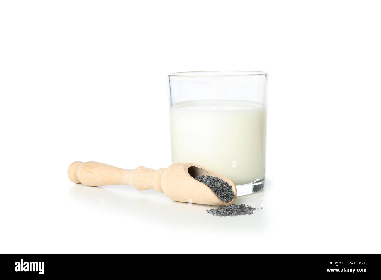 Poppy milk and scoop with poppy seeds isolated on white background ...