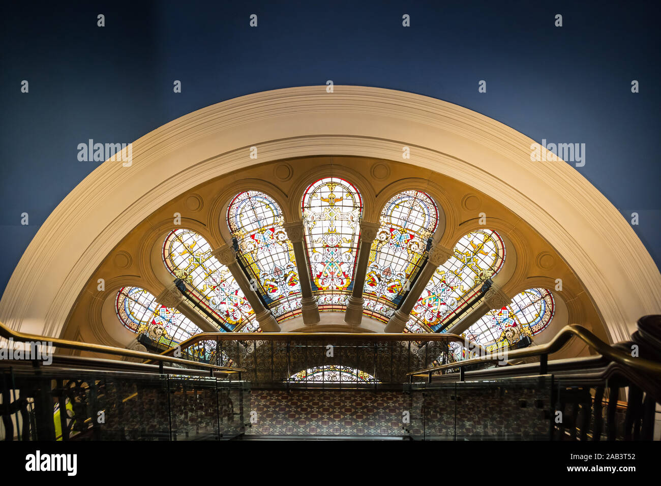 Intereior of Queen Victoria Building showing a stained glass window ...