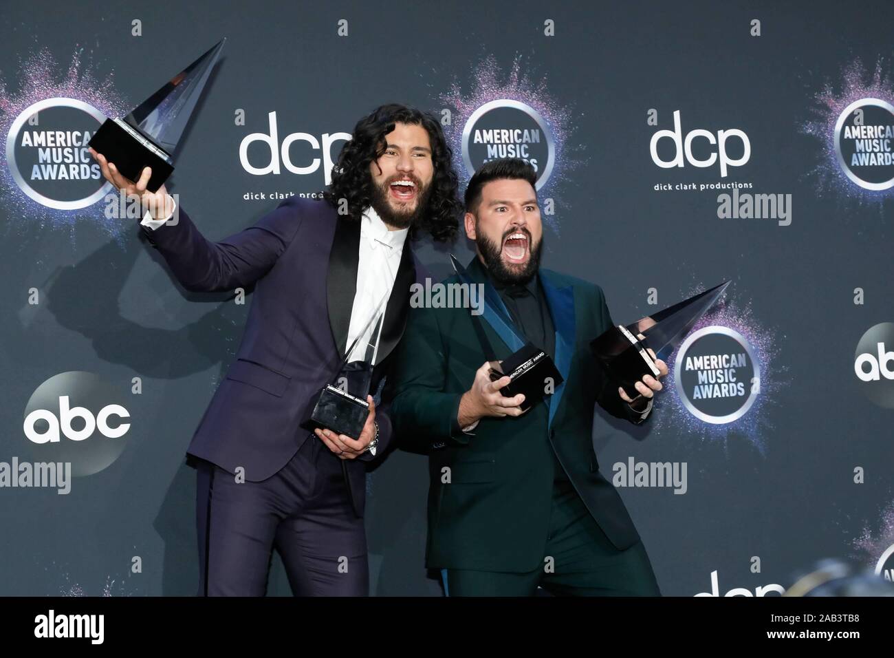 Dan + Shay pose in the press room of the 2019 American Music Awards ...