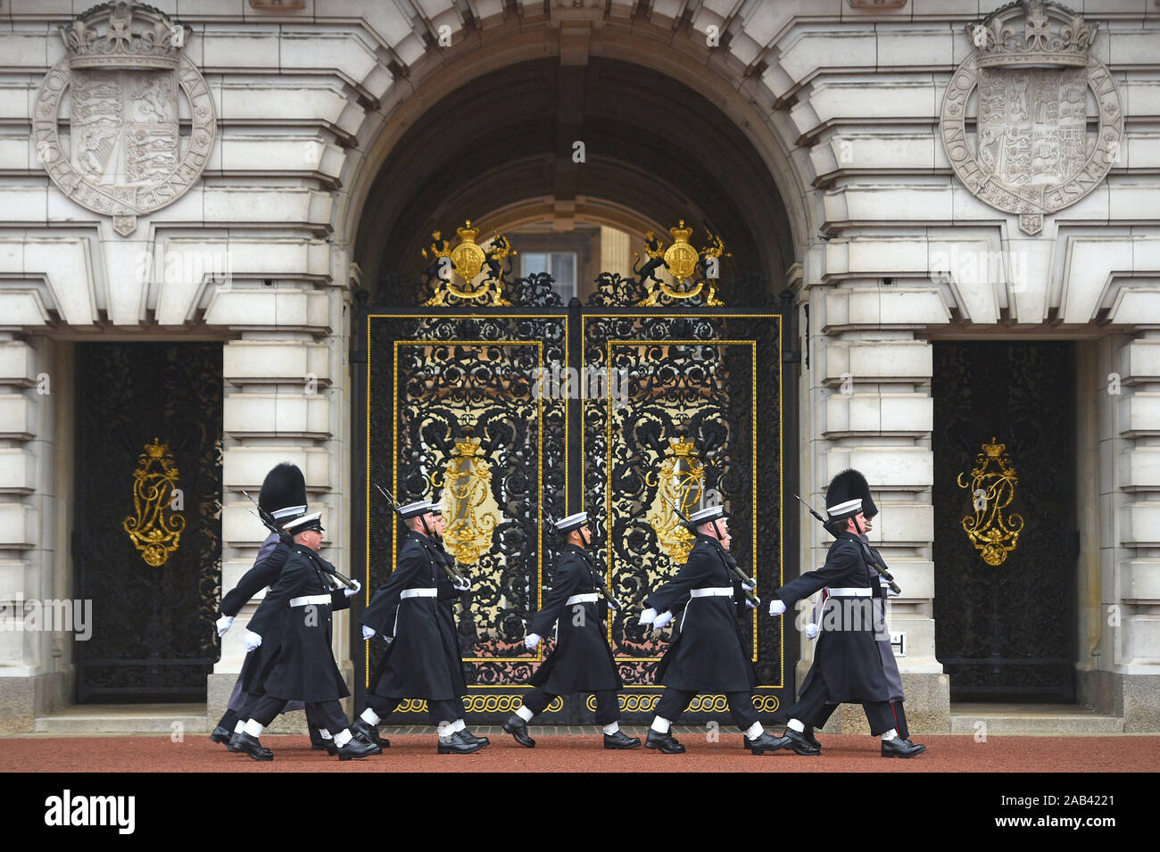 Sailors from the Royal Navy perform the Changing of the Guard ceremony ...