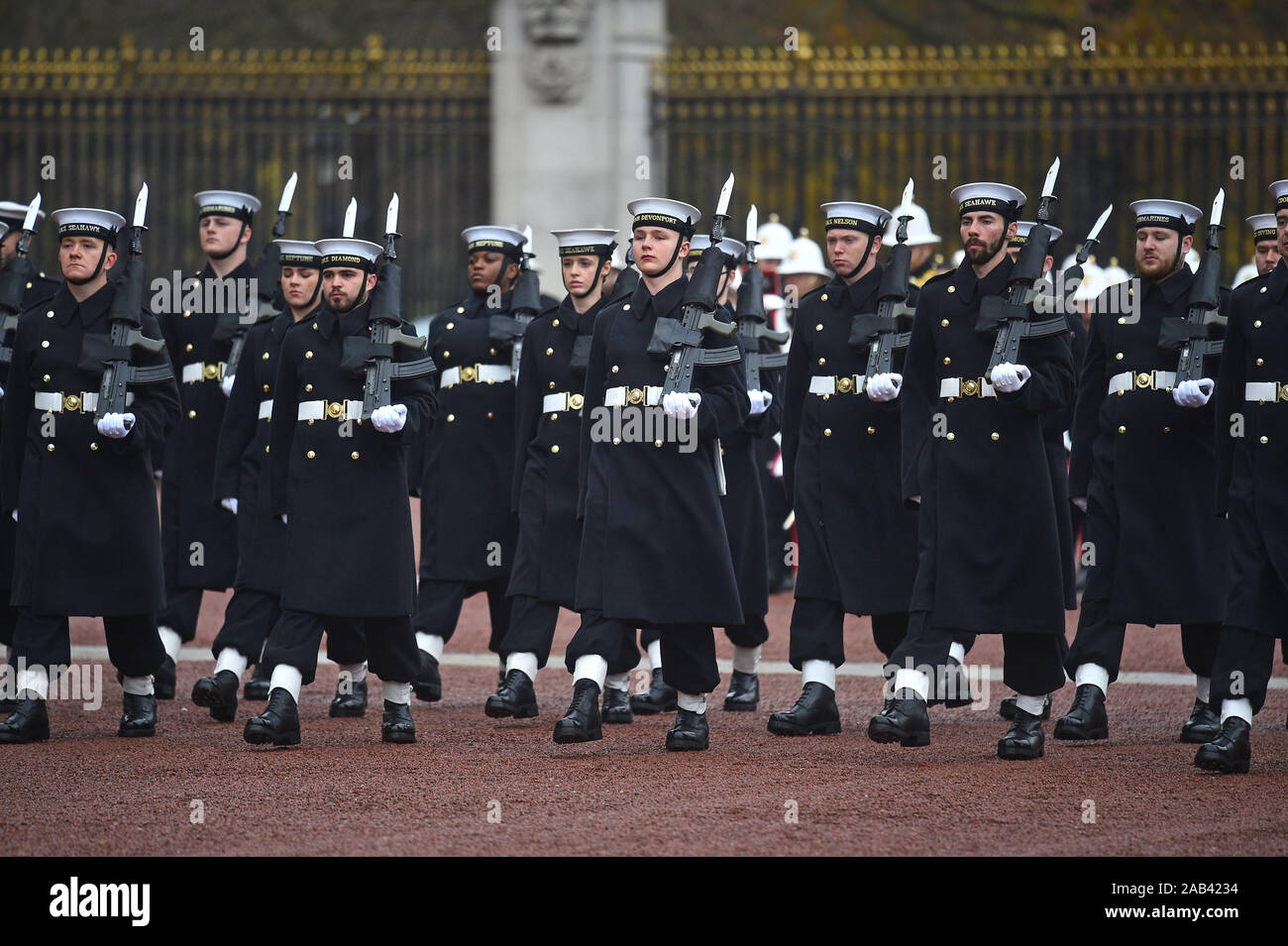 Sailors from the Royal Navy perform the Changing of the Guard ceremony ...