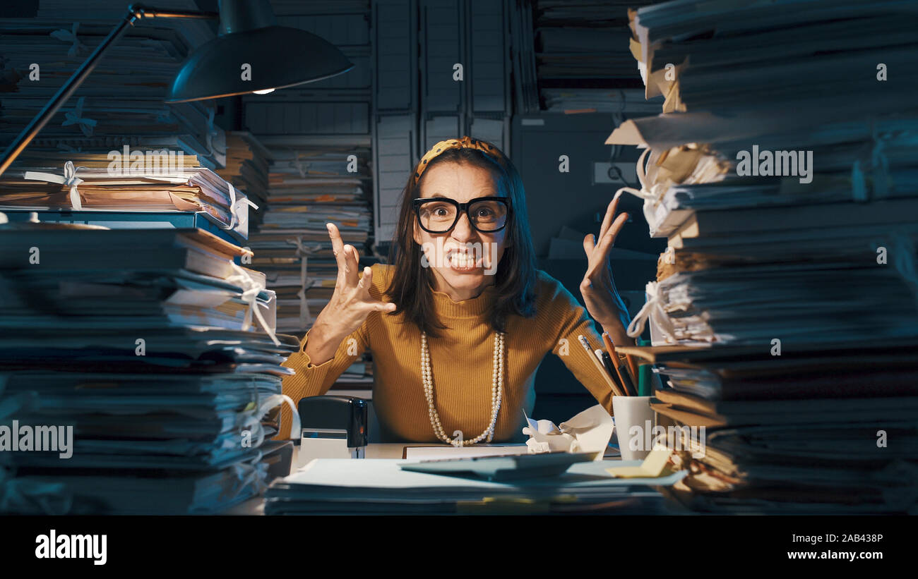 Female at messy desk hi-res stock photography and images - Alamy