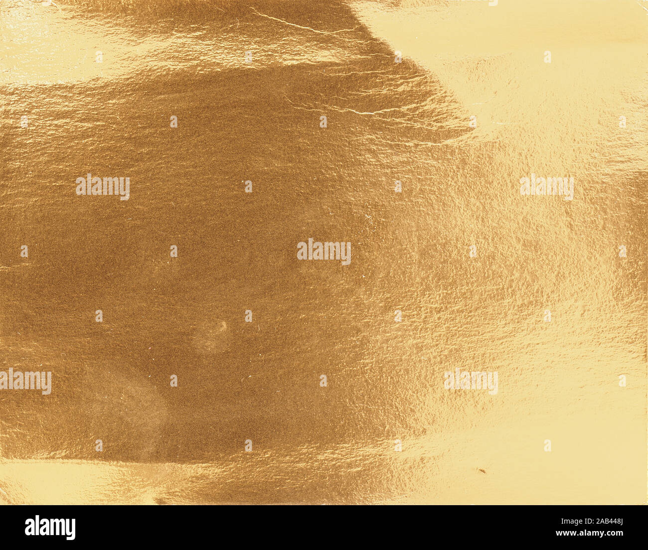 In gold painted paper texture using as luxury or festive background ...
