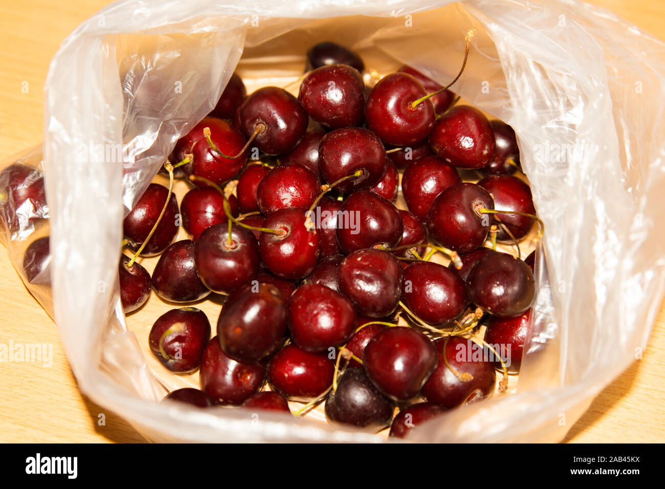 Cherry red bag hi-res stock photography and images - Alamy