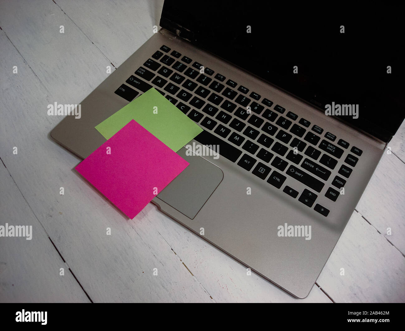Colorful sticky note on laptop keyboard. Post it on keyboard Stock ...