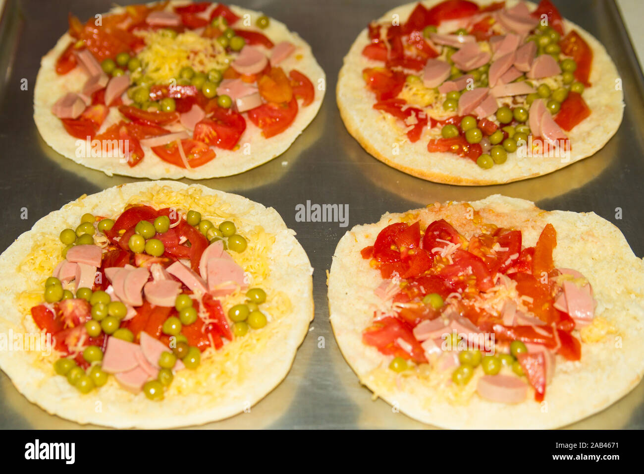 Cooking pizza at home Stock Photo - Alamy