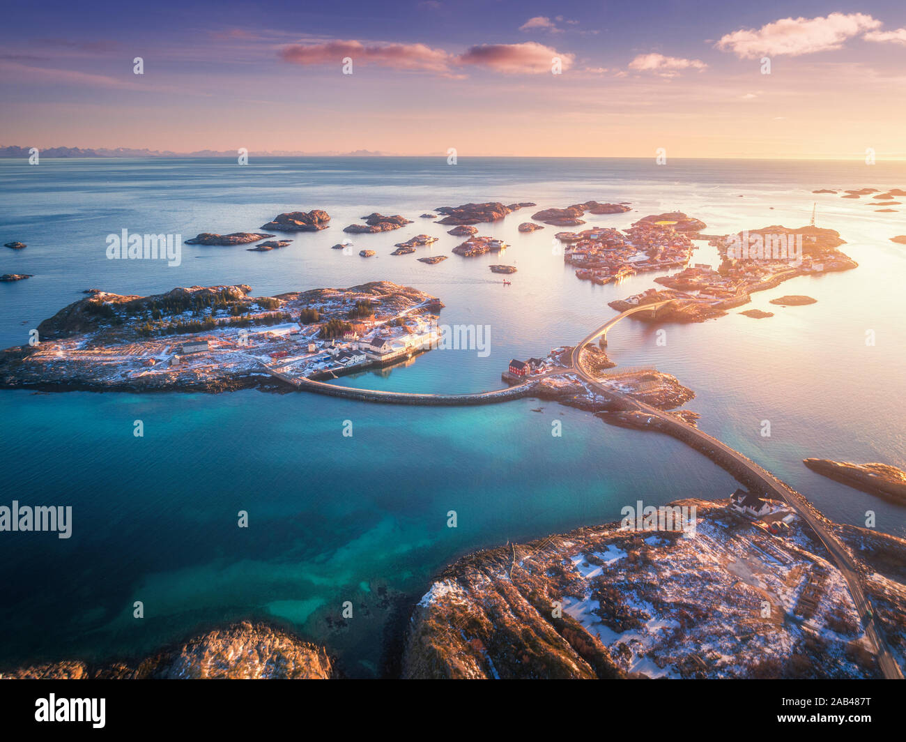 Aerial view of small islands, bridge over the sea at sunset Stock Photo ...
