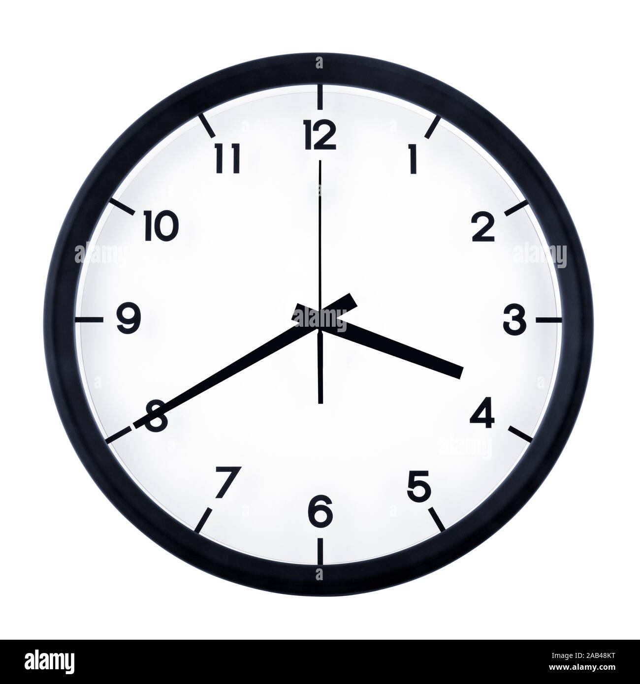 Classic analog clock pointing at three forty, isolated on white ...