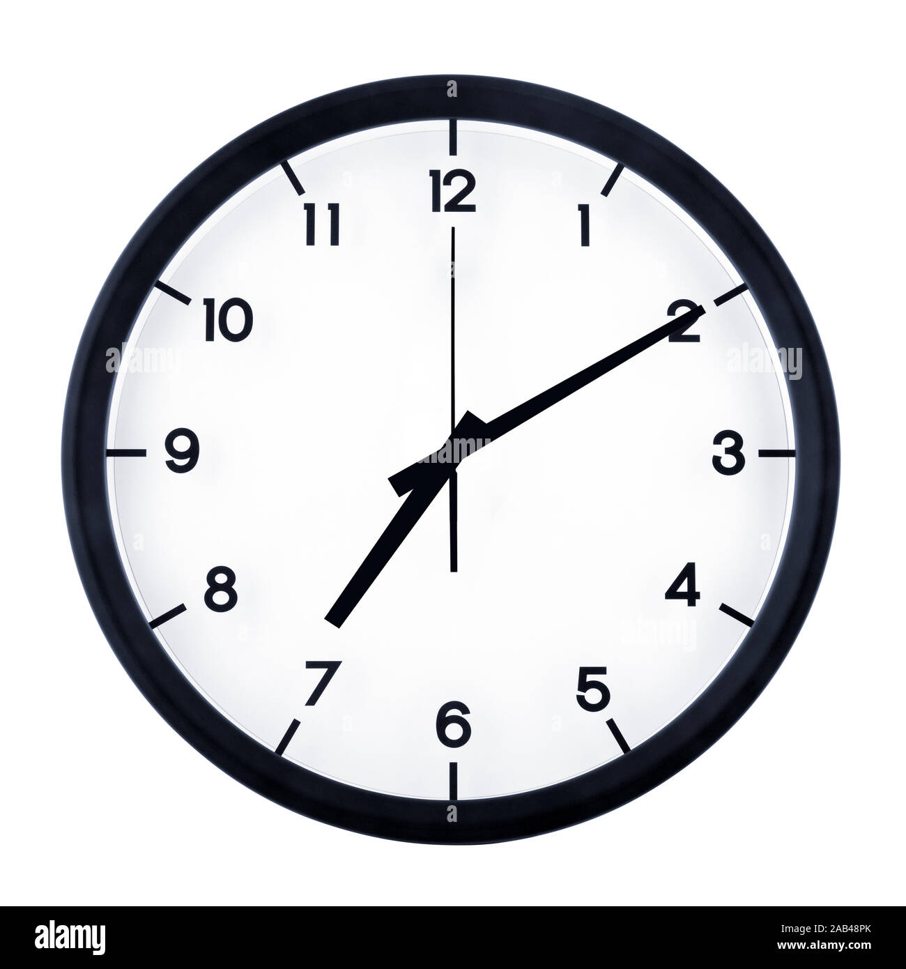 Classic analog clock pointing at seven ten, isolated on white ...