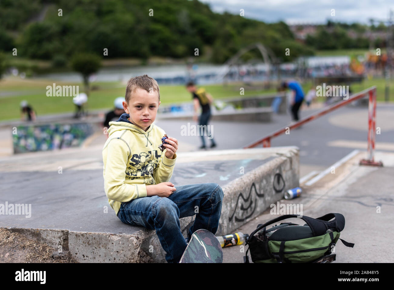 A cute little boy with ADHD, autism, Asperger syndrome riding around ...