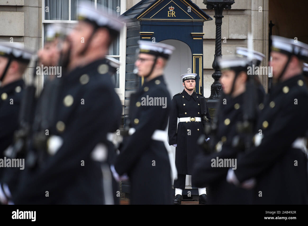 Sailors from the Royal Navy perform the Changing of the Guard ceremony ...