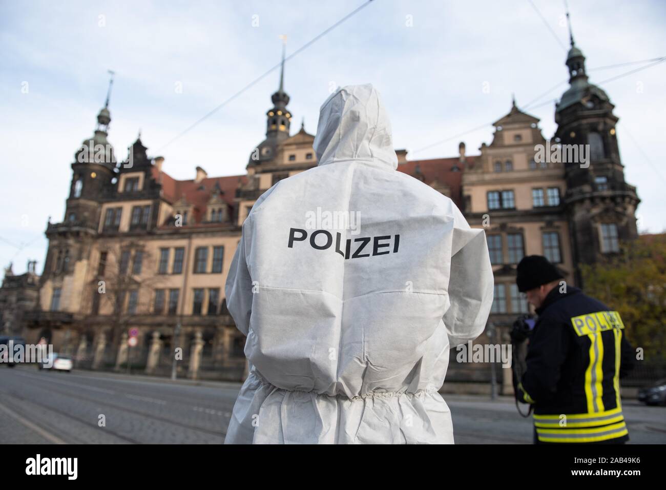 Dresden, Germany. 25th Nov, 2019. Two policemen stand in front of the ...