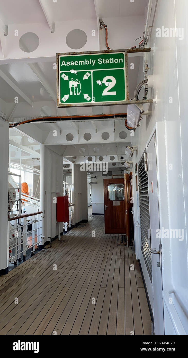 A cruise ship sign designating where the assembly station is in case of ...