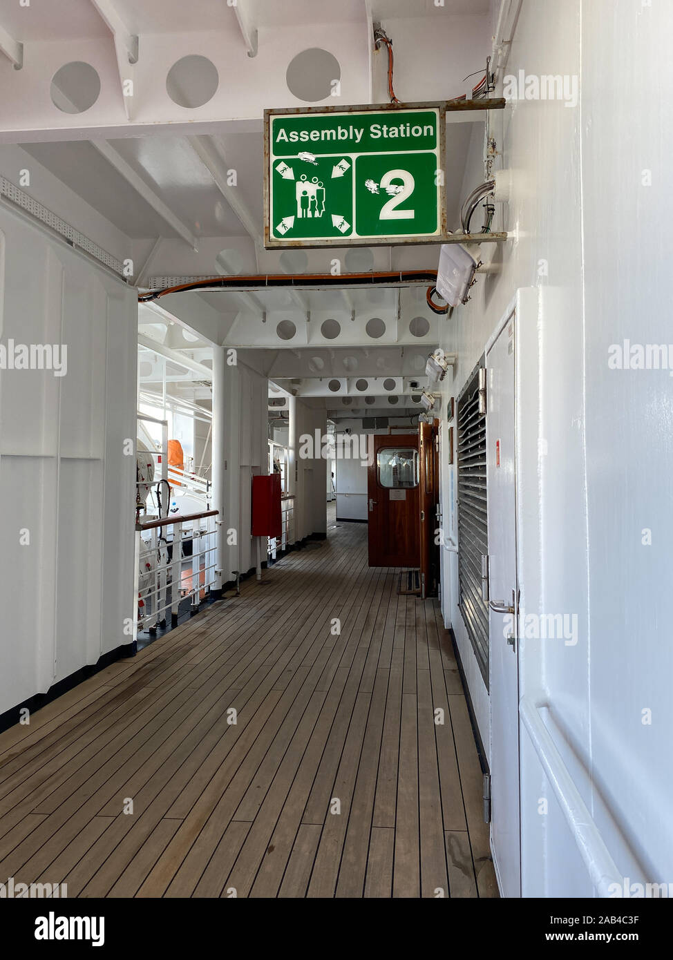 A cruise ship sign designating where the assembly station is in case of ...