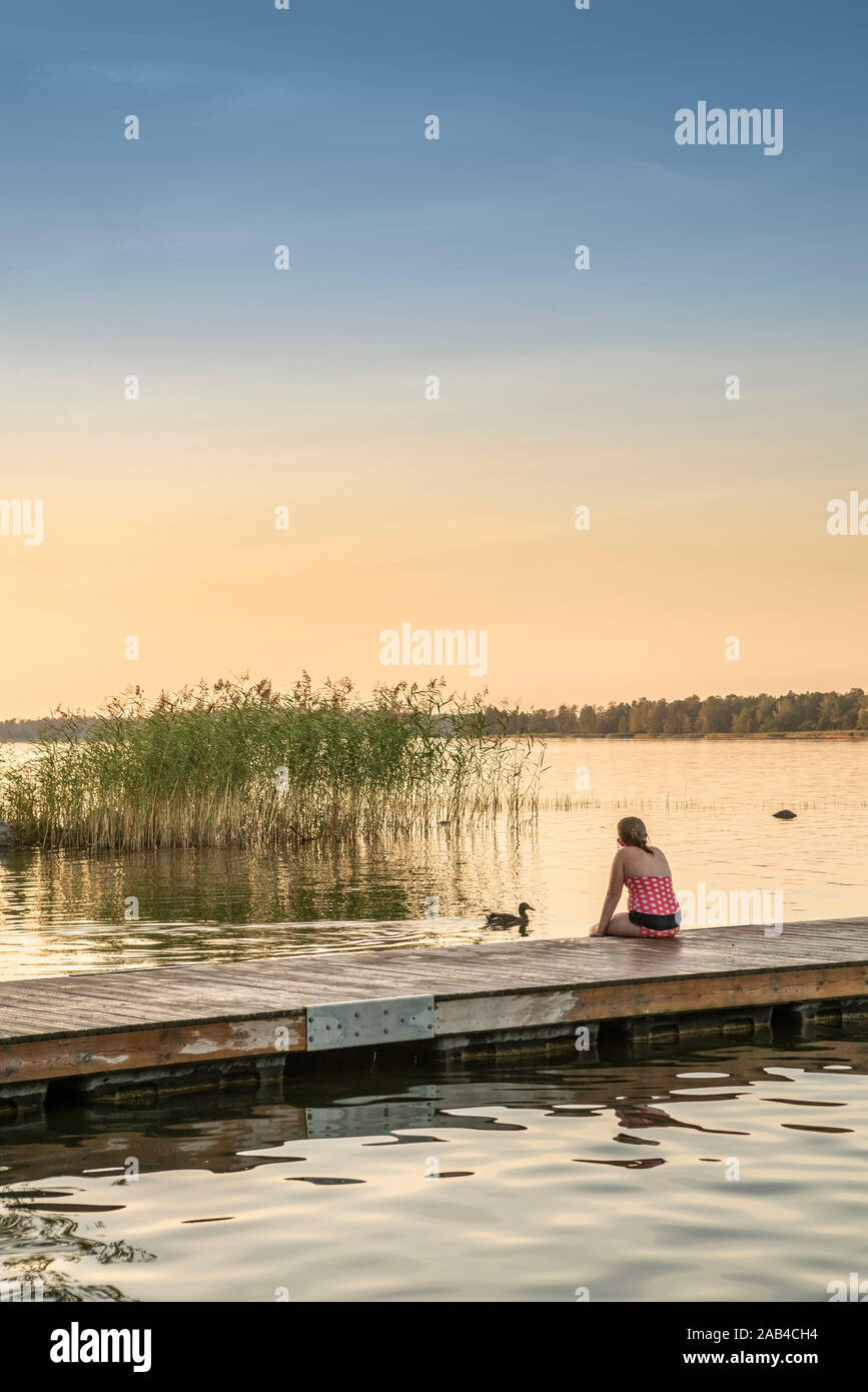 Sad Girl Sitting Alone Outside High Resolution Stock Photography and ...