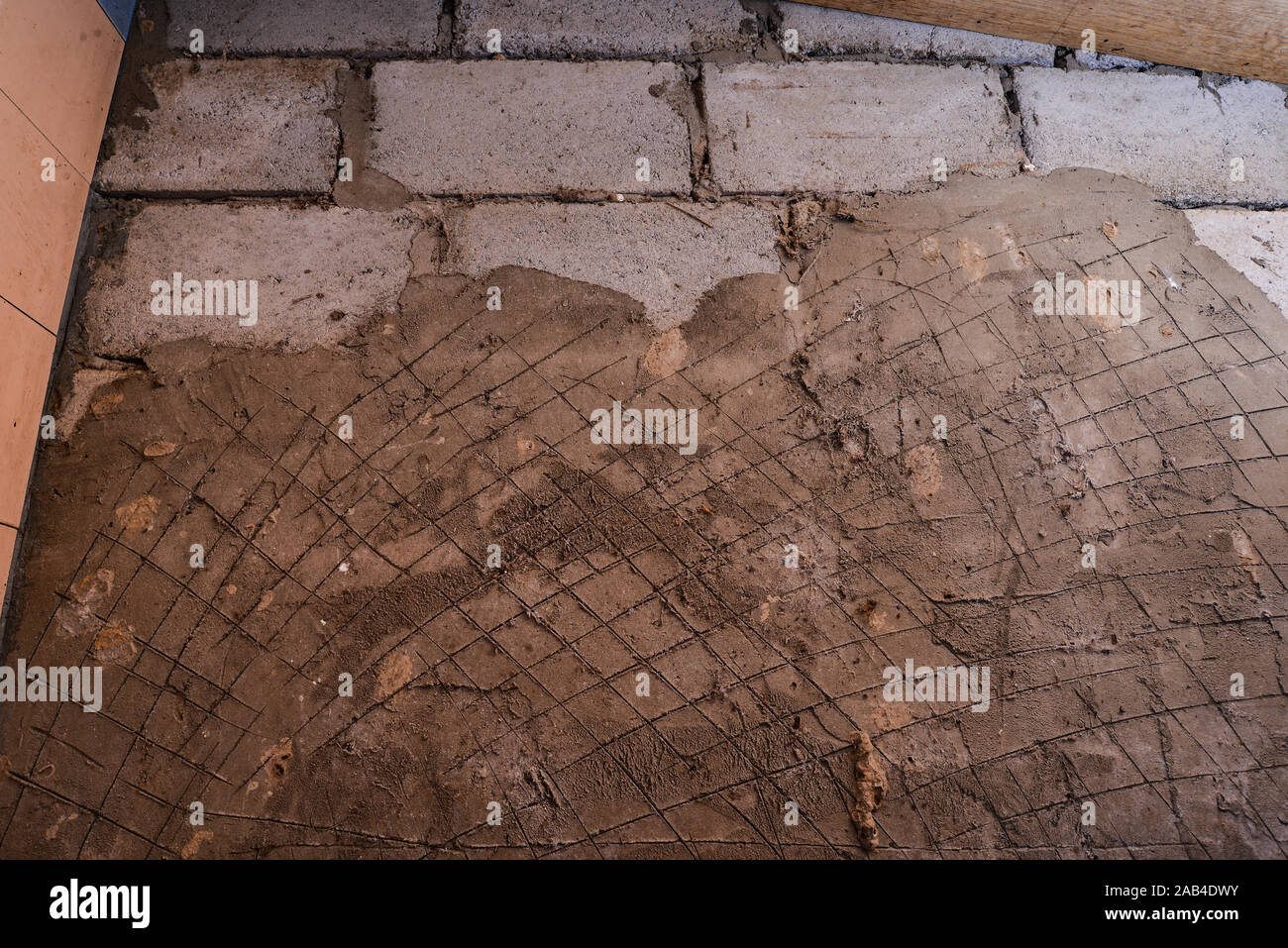The built wall is not finished and abandoned Stock Photo - Alamy