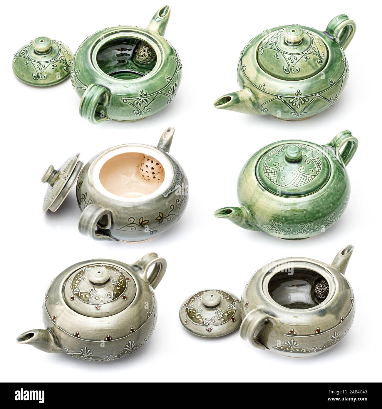 Set of handmade ceramic teapots on white background Stock Photo - Alamy