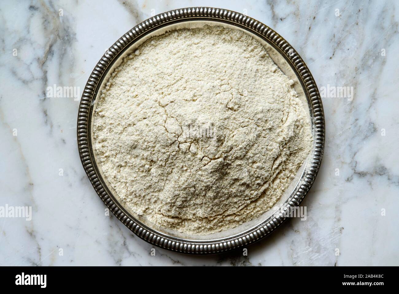 Kaunch beej churna, powder in a bowl, aphrodisiac and revitalizing ...