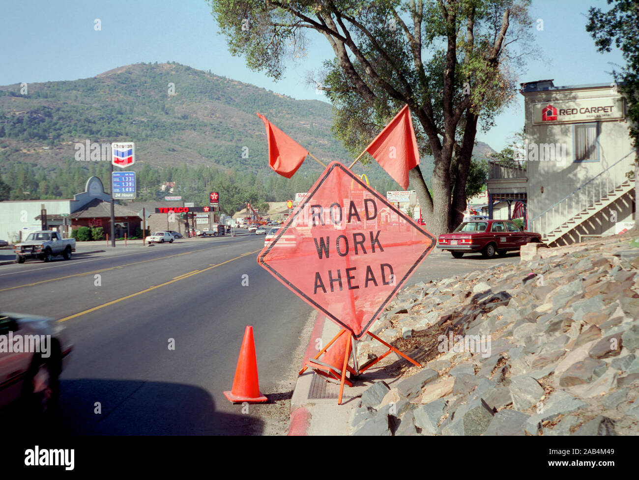 USA highway with work ahead sign in the 1980's Stock Photo - Alamy