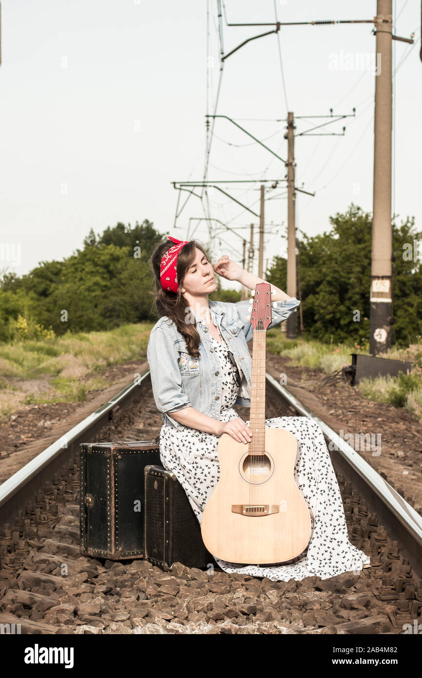 Beautiful girl on train tracks hi-res stock photography and images - Alamy