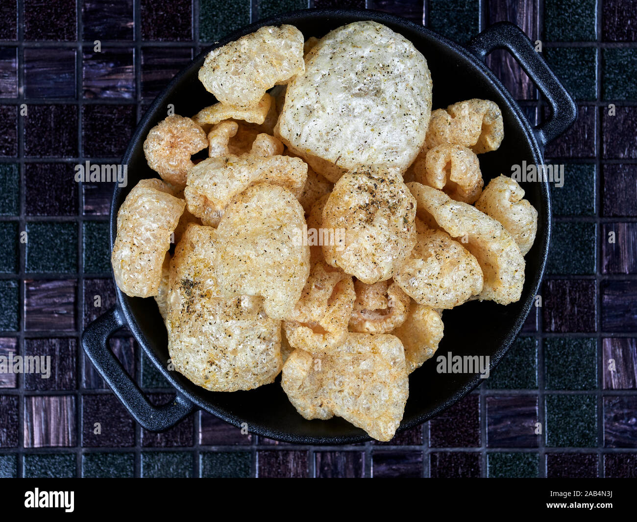 Pork rinds also known as chicharron or chicharrons, deep fried pork ...