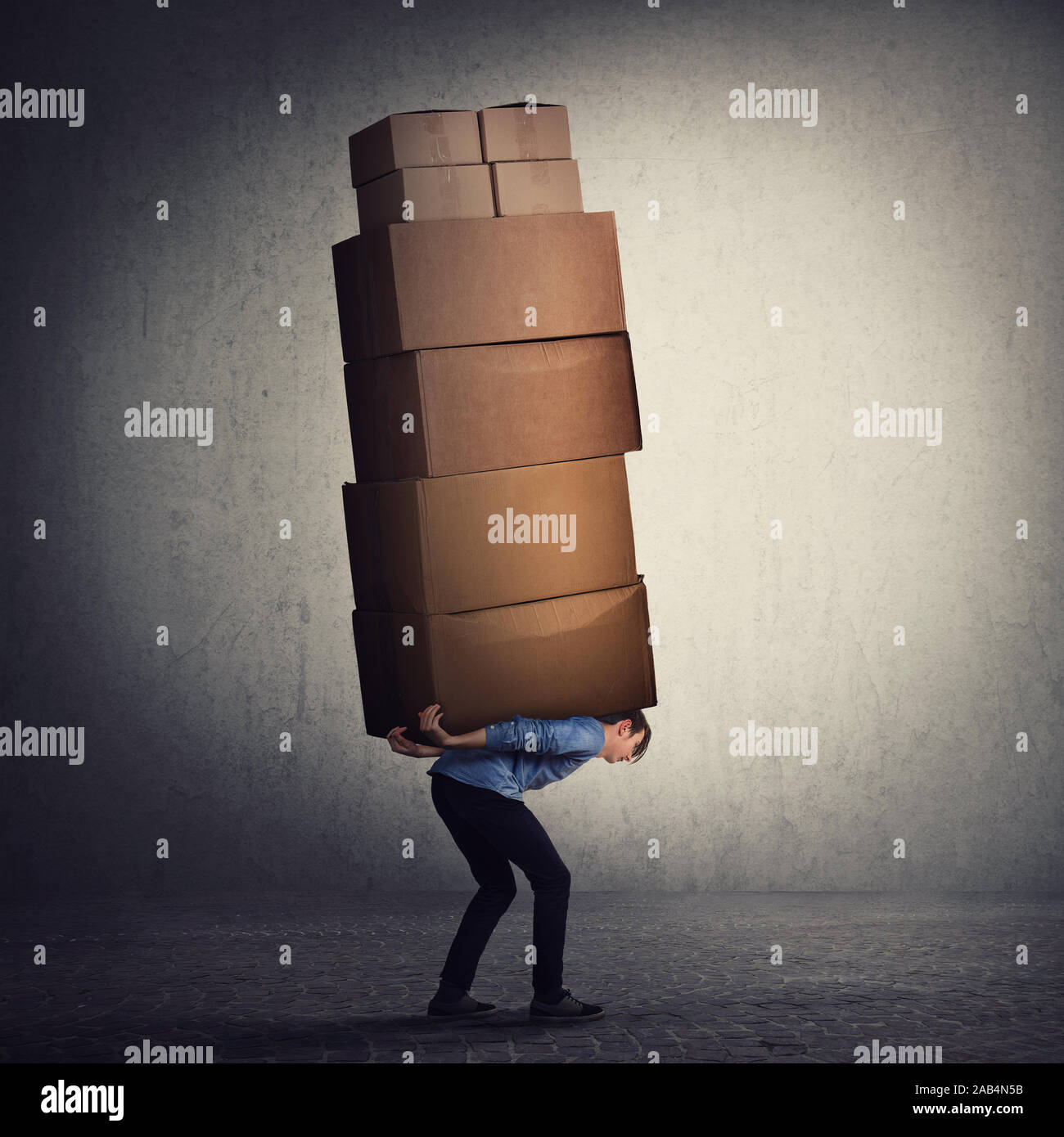 Man carrying heavy load on back hi-res stock photography and images - Alamy