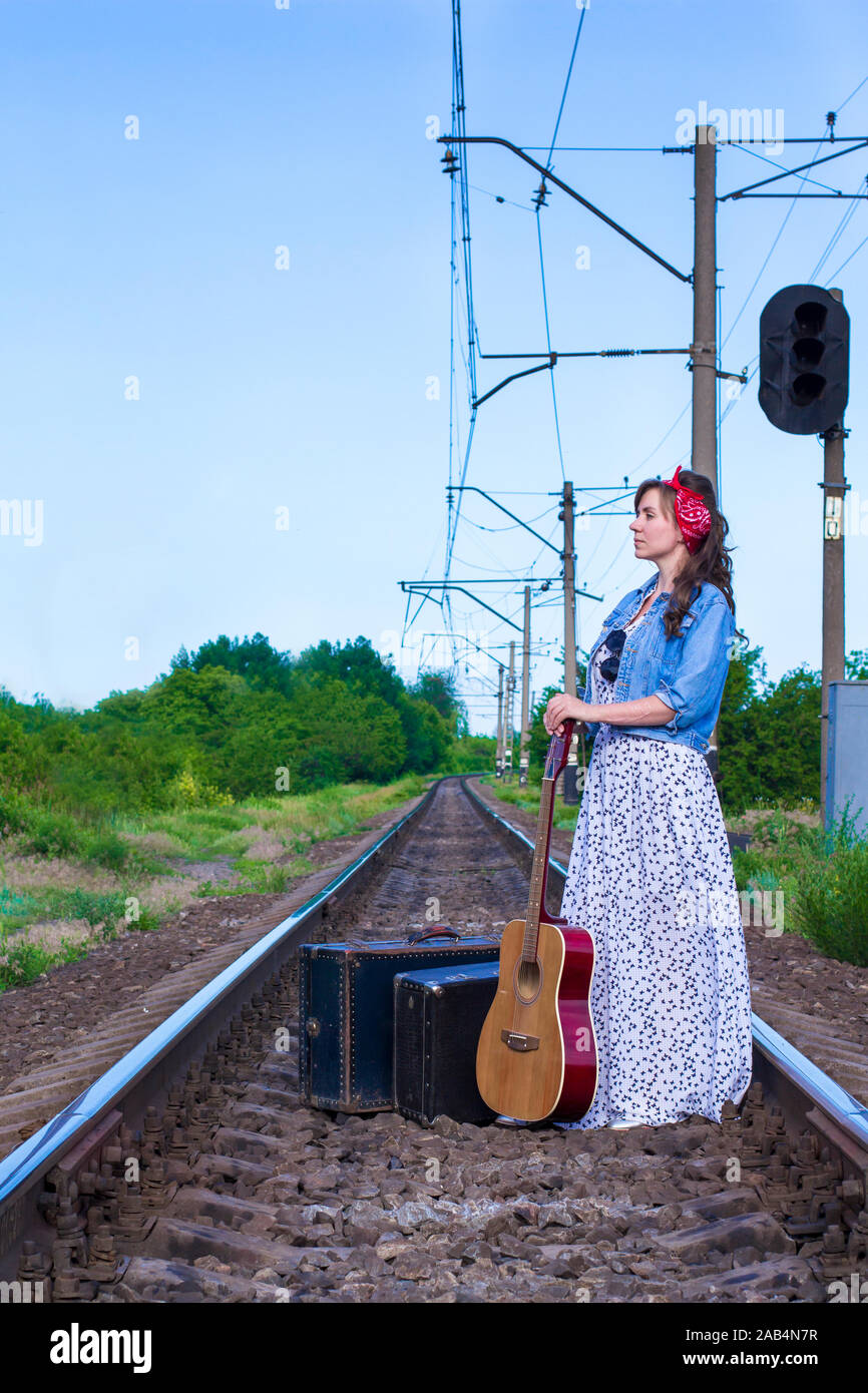 Beautiful girl on train tracks hi-res stock photography and images - Alamy