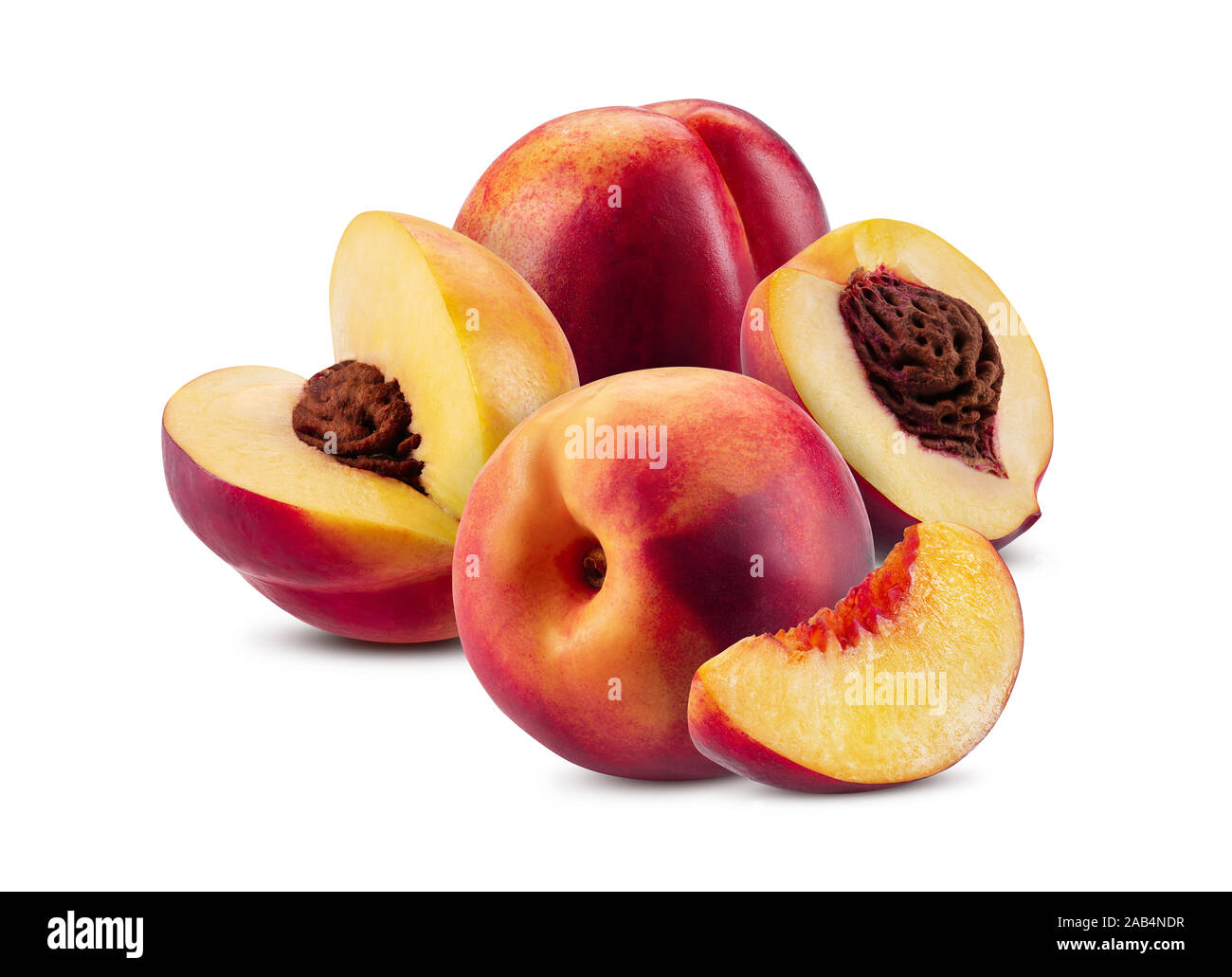 Set of smooth-skinned whole nectarines and parts with kernels and ...