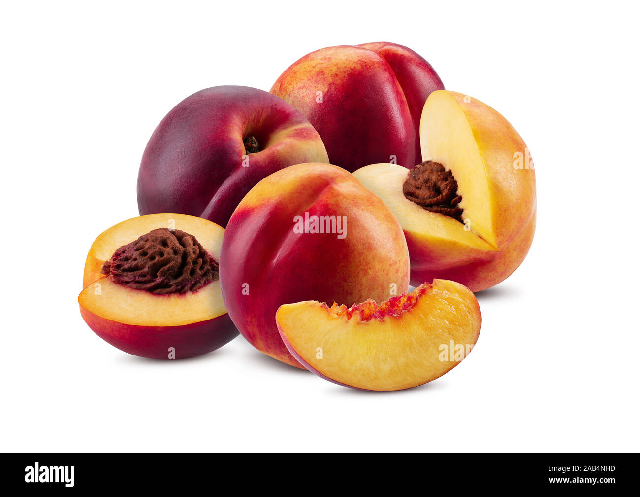 Set of smooth-skinned whole nectarines and parts with kernels and ...