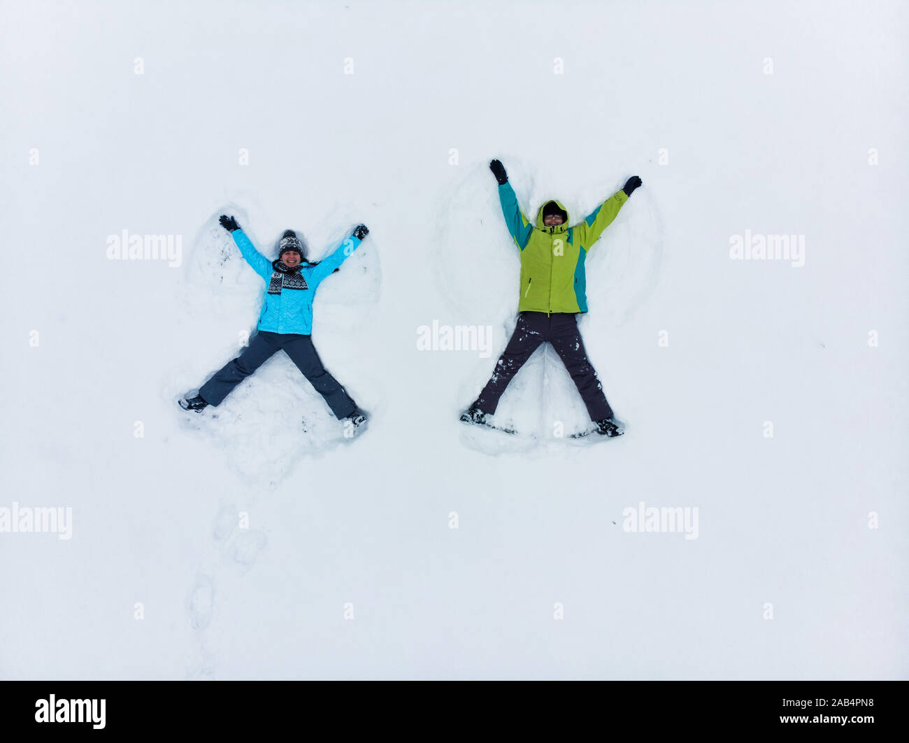 Snow angel couple hi-res stock photography and images - Alamy