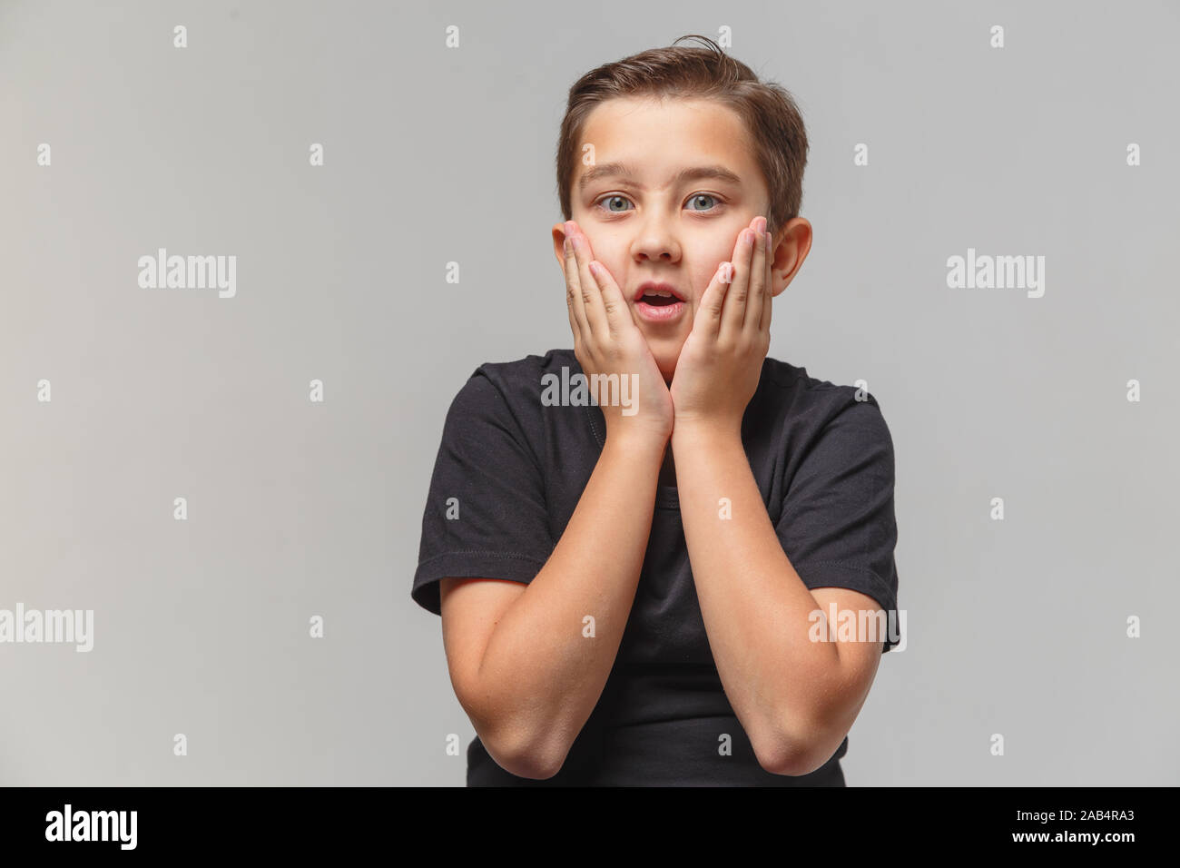 Boy head in hands hi-res stock photography and images - Alamy