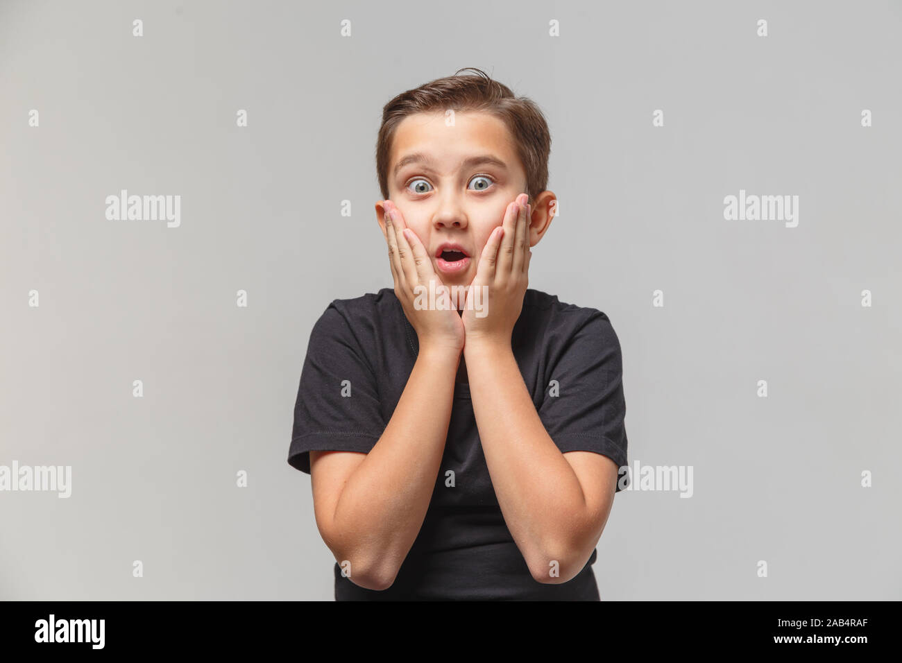 Hands on face shock hi-res stock photography and images - Alamy