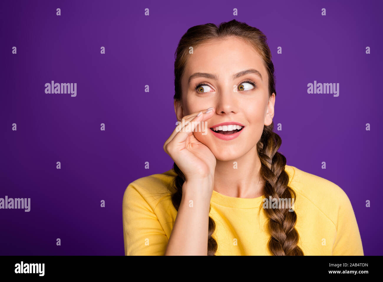 Photo of tricky lady long braids hairdo hold arm near mouth sharing ...