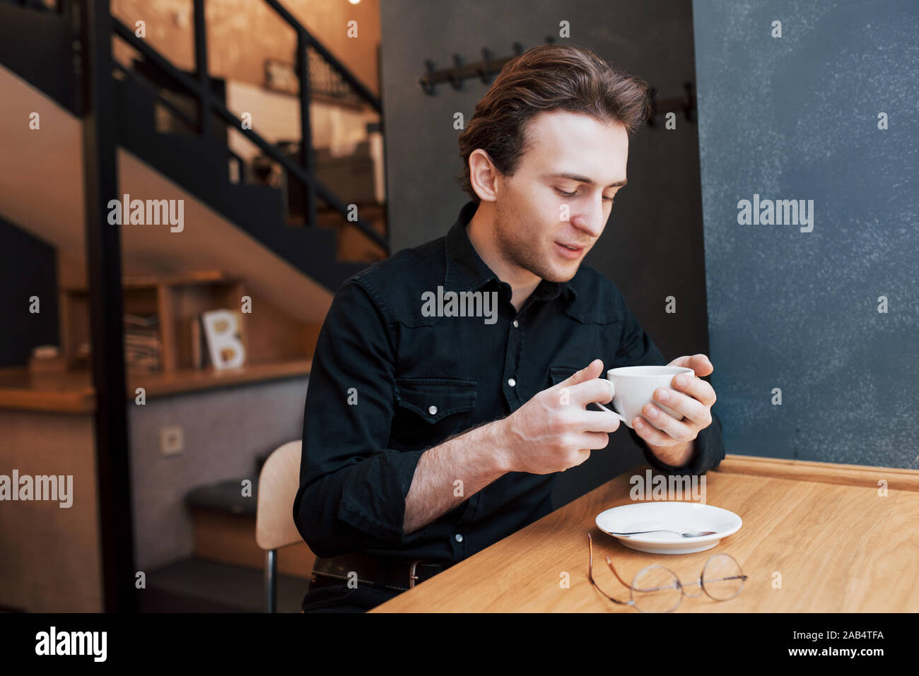 Handsome man eating beard fork hi-res stock photography and images - Alamy