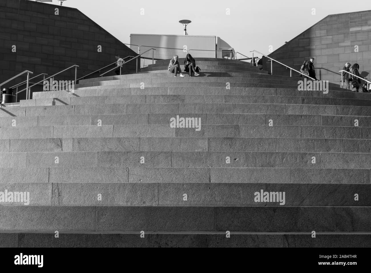 Chatting on the Stone Steps in Liverpool One Stock Photo - Alamy