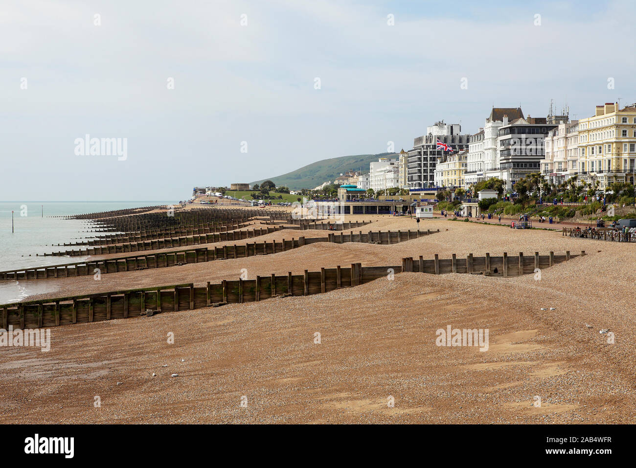 Seafront hotels and multiple groynes on Eastbourne beach, viewed here ...