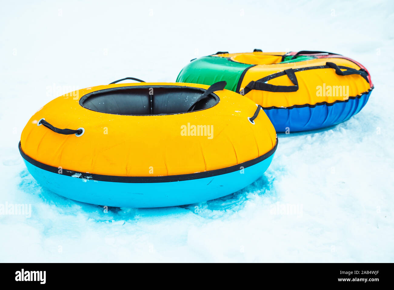 snow tubing rings close up. hill on background Stock Photo - Alamy