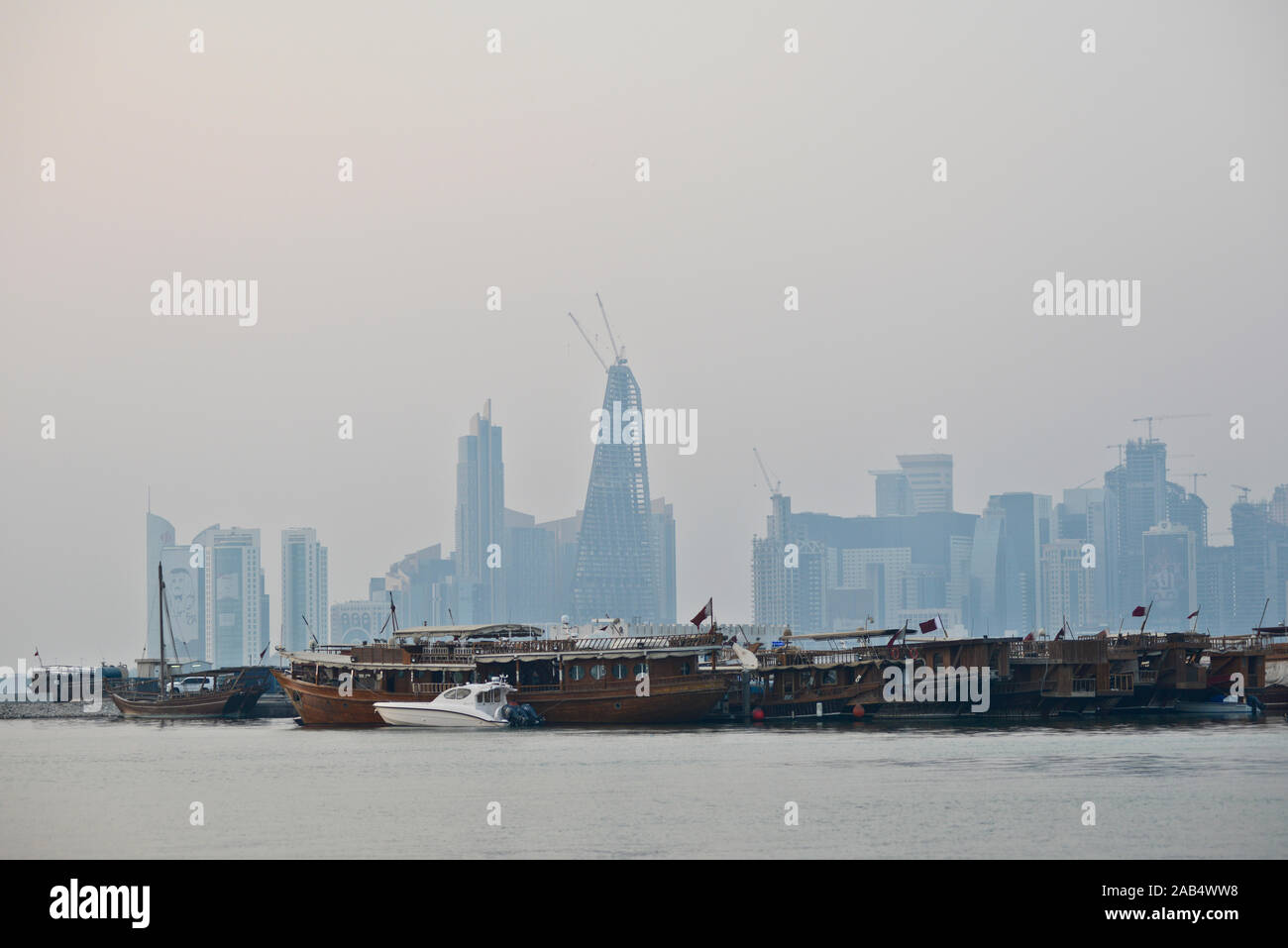 Dhow harbor with skyline in the background, Doha, Qatar Stock Photo - Alamy