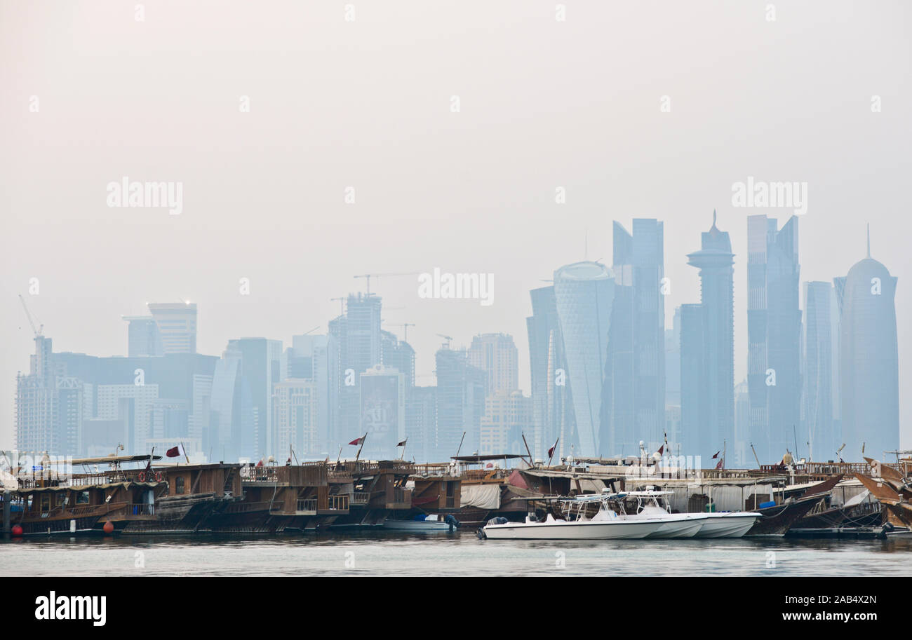 Dhow harbor with skyline in the background, Doha, Qatar Stock Photo - Alamy