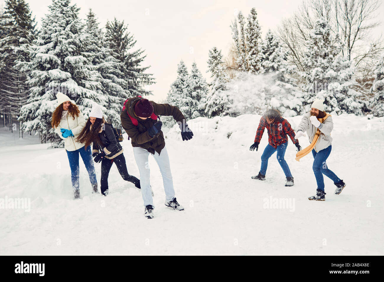 Funny snowball fight hi-res stock photography and images - Alamy