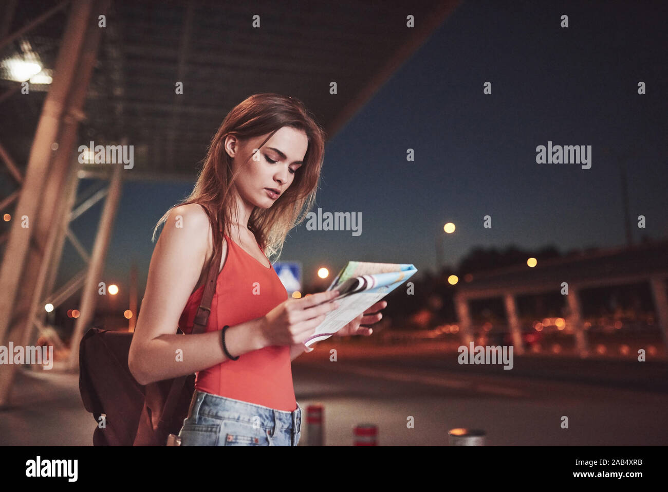Girl looking back night hi-res stock photography and images - Alamy