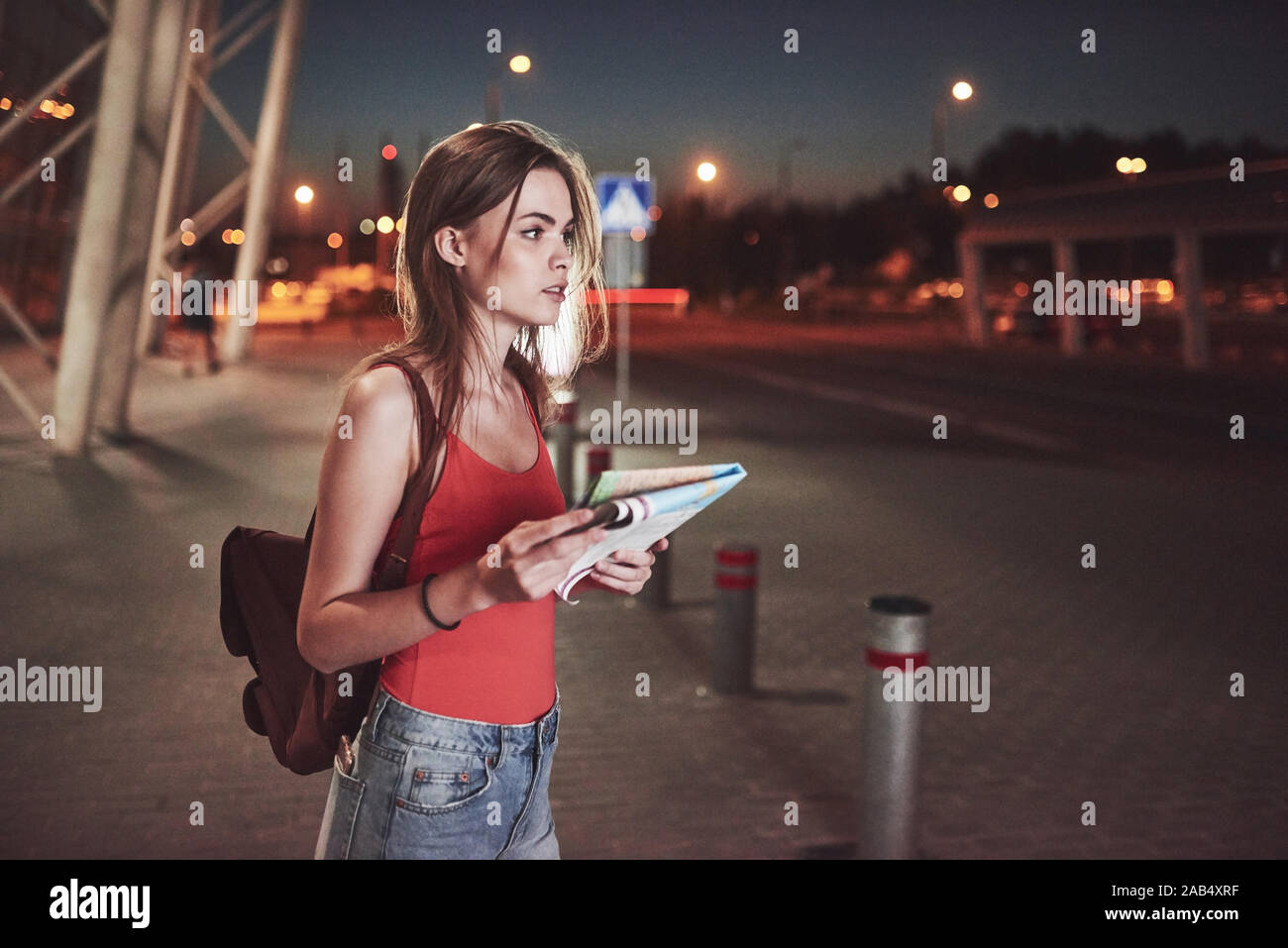 Girl looking back night hi-res stock photography and images - Alamy